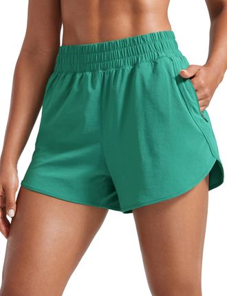 CRZ YOGA Damen Kurz Sporthose Laufhose High Waist Fitness Sport Shorts Kurze Hose mit Rei&szlig;verschlusstasche Cascadia Gr&uuml;n 34
