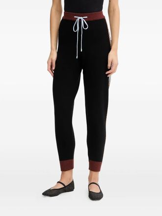 Never Fully Dressed Palmen-Jogginghose mit Kordelzug - Schwarz