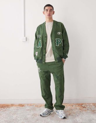 Aape By A Bathing Ape Aape By A Bathing Ape - Pantalon de jogging ample &agrave; motif camouflage - Vert fonc&eacute;-Multicolore