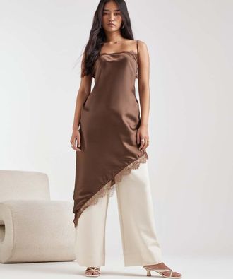 Dolce Vita Brevel - Riemchen-Sandaletten aus Leder in Wollwei&szlig; mit niedrigem Absatz