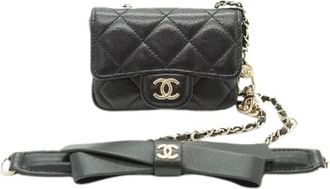 Chanel Sac bandouli&egrave;re convertible &agrave; cha&icirc;ne mini Matelass&eacute; &agrave; ruban en cuir dagneau Pre-owned - Femme - Pre-owned - Noir - Taille: ONE Size