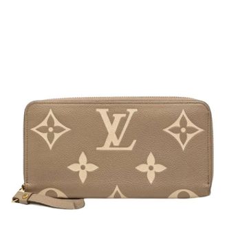 Louis Vuitton Portefeuille zipp&eacute; Monogram Empreinte Pre-owned - Femme - Pre-owned - Brun - Taille: ONE Size