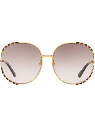 Gucci lunettes de soleil GG0595S &agrave; monture ronde - Jaune