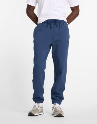 New Balance Athletics jogger en molleton fran&ccedil;ais bleu marine NB