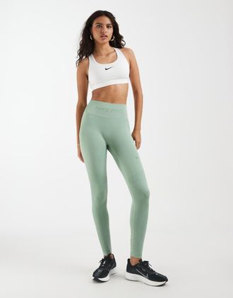 Nike Pro Dri-FIT - Nahtlose 7/8 Leggings in Gr&uuml;n