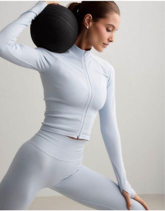 Aim'n Veste zipp&eacute;e sans coutures effet sculptant - Aura-Bleu