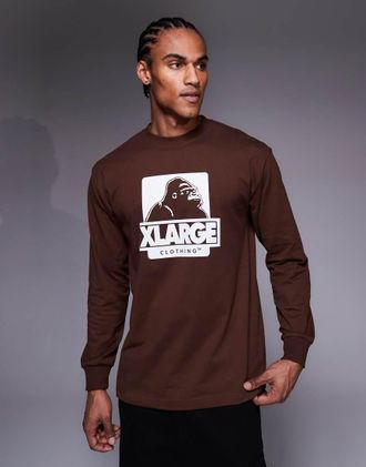 XLARGE XLarge - OG - Lang&auml;rmliges T-Shirt in Braun mit Grafiklogo-Brown