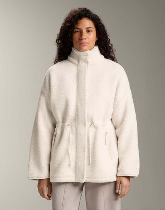 Oysho Jacke aus Lammfellimitat in Ecru mit verstellbarer Taille-Neutral