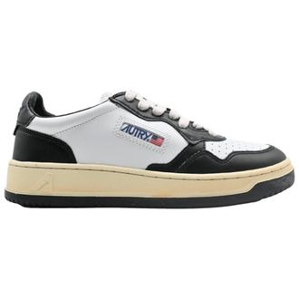Autry Femme, Chaussures, Noir, Taille: 35 EU Baskets Basse en Cuir Noir