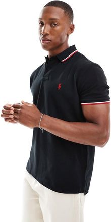 Polo Ralph Lauren Polo en piqu&eacute; &agrave; liser&eacute;s et logo embl&eacute;matique - Noir