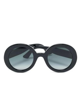 Gucci lunettes de soleil GG0319S &agrave; monture ronde - Noir