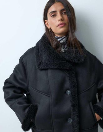Asos veste en peau retourn&eacute;e doubl&eacute;e imitation peau de mouton &agrave; col drap&eacute; noire