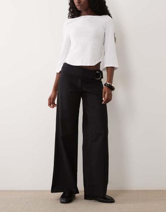 Motel falitasa pantalon taille basse avec ceinture noir