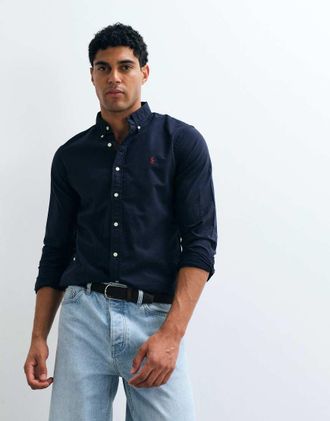 Polo Ralph Lauren chemise Oxford slim fit teinte en pi&egrave;ce &agrave; logo iconique bleu marine