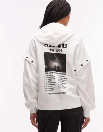 AllSaints Amphia - Sweat &agrave; capuche avec manches amovibles et imprim&eacute; graphique au dos - Blanc