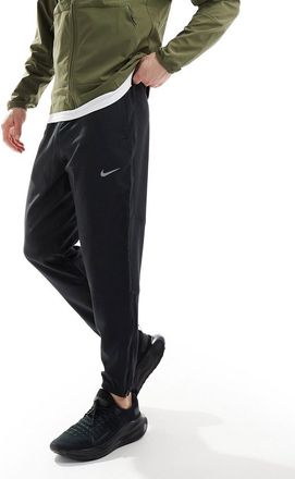 Nike Challenger - Pantalon de jogging en tissu Dri-FIT - Noir