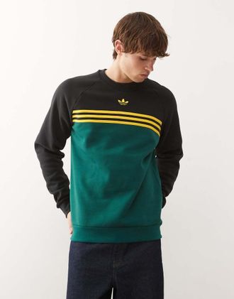 adidas Originals Sweat ras de cou avec rayures sur la poitrine - Vert universitaire/noir