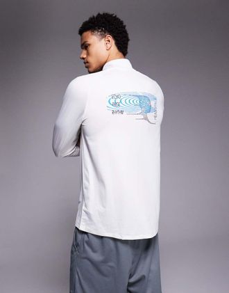 Nike Stride Energy - Top à manches longues et col zippé en tissu Dri-FIT - Blanc