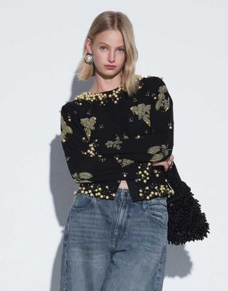 Asos veste orn&eacute;e de d&eacute;tails troph&eacute;e en noir et or-Dor&eacute;