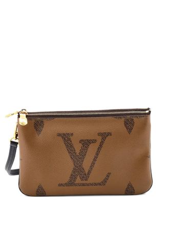 Louis Vuitton pochette &agrave; double fermeture zipp&eacute;e &agrave; motif monogramm&eacute; Reverse Giant - Marron