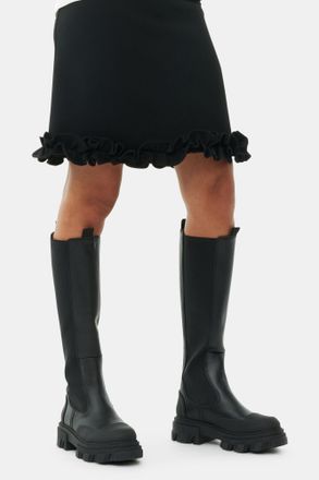 Ganni Bottes Chelsea hautes &agrave; semelle crant&eacute;e en noir - Pour Femme