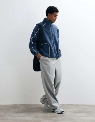 Asos polaire oversize imitation peau de mouton zipp&eacute;e avec passepoil en bleu