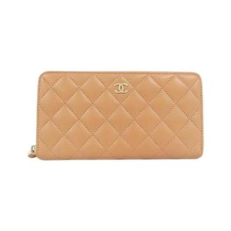 Chanel Portefeuille long Timeless Classic en cuir dagneau doccasion - Femme - Pre-owned - Beige - Taille: ONE Size