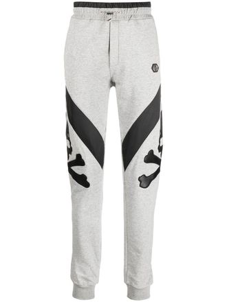 Philipp Plein pantalon de jogging &agrave; imprim&eacute; t&ecirc;te de mort - Gris