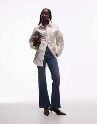 Abrand 00 - Schlagjeans in verwaschenem Indigoblau mit superniedrigem Bund