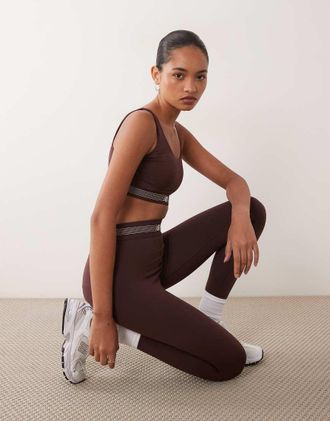 New Balance legging dentra&icirc;nement 25 couleur cuir cerise-Marron