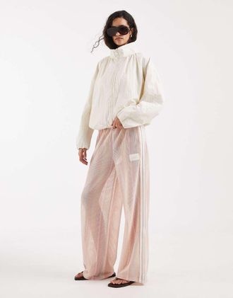 adidas Originals Firebird - Pantalon de surv&ecirc;tement en maille - Rose sable