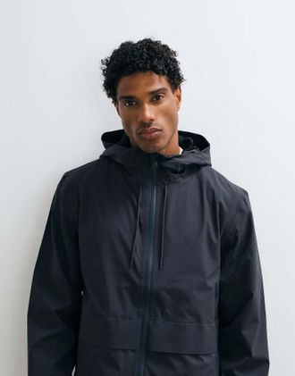 Rains Suva veste longue &agrave; capuche hardshell imperm&eacute;able bleu marine-noir