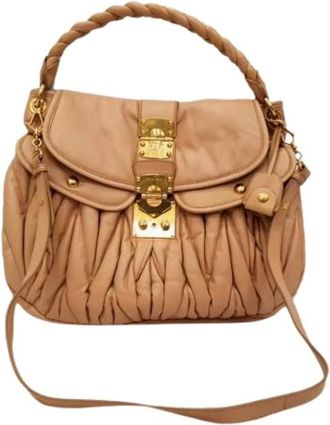 Miu Miu Sacs &agrave; main en cuir doccasion - Femme - Pre-owned - Beige - Taille: ONE Size