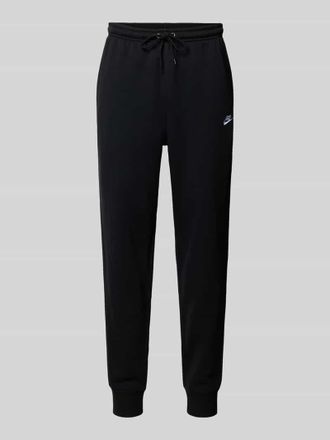Nike Sweatpants mit Label-Stitching und Ges&auml;&szlig;tasche