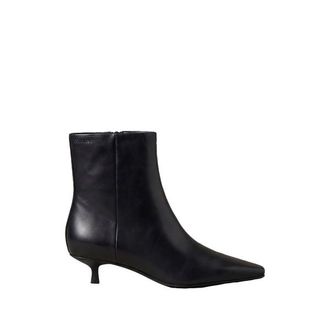 Calvin Klein Bottines unies zipp&eacute;es en cuir