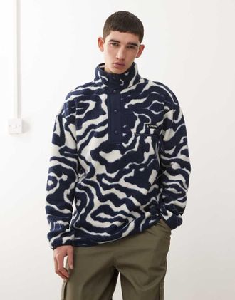 Columbia Helvetia - Fleece-Sweatshirt in Marineblau und Beige mit kurzer Druckknopfleiste und Wirbelmuster