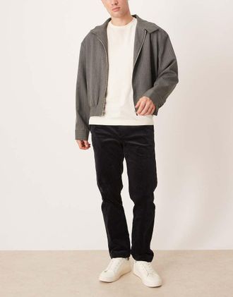 Mango Schmal zulaufende Hose aus Cord in Marineblau