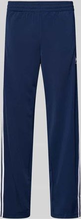 adidas Originals Trainingshose mit Kontraststreifen und Rei&szlig;verschlusstaschen