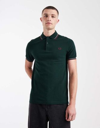 Fred Perry Dunkelgr&uuml;nes Polohemd mit zwei Zierstreifen und Logo