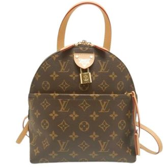 Louis Vuitton Sac &agrave; dos Pre-owned en toile Monogram - Femme - Pre-owned - Brun - Taille: ONE Size