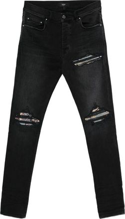 Amiri Patchwork-distressed Cotton Jeans