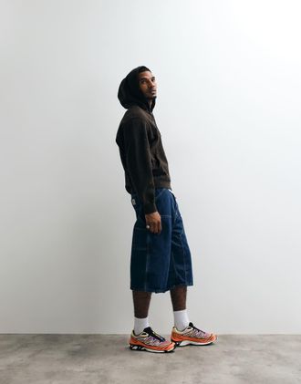 Carhartt Work in Progress OG - Lange Shorts in blauer Stone-Waschung mit doppelter Stofflage im Kniebereich
