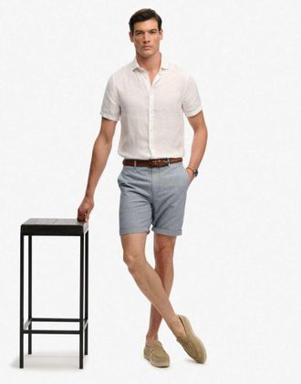 Superdry Short chino textur&eacute; de qualit&eacute; sup&eacute;rieure &agrave; motif pied-de-poule - Bleu