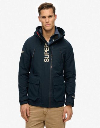 Superdry ultimate Windbreaker mit Kapuze und Stickerei in Eclipse-Marineblau
