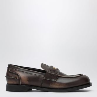 Miu Miu Loafer aus Leder in Ebenholz mit Vintage-Effekt