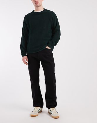 Tommy Jeans Ryan - Schmal und gerade geschnittene Jeans in Schwarz