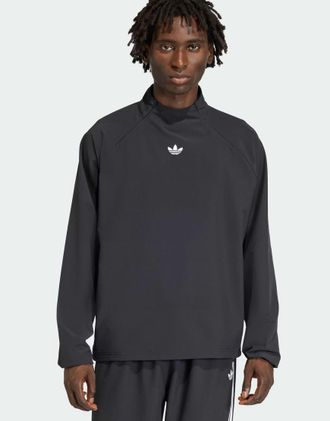 adidas Originals Adidas adicolor - Haut dentra&icirc;nement tiss&eacute; - Noir