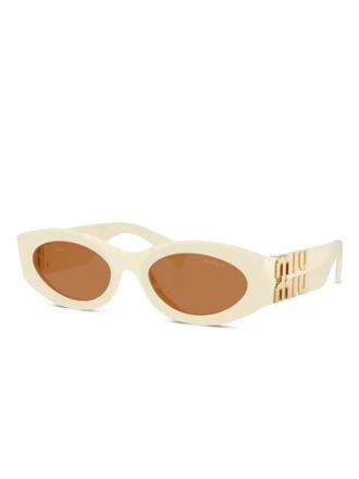 Miu Miu Eyewear lunettes de soleil &agrave; logo - Tons neutres