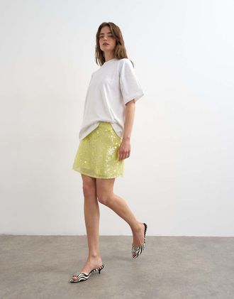 Topshop Mini-jupe nou&eacute;e sur les c&ocirc;t&eacute;s avec fleurs et sequins - Jaune
