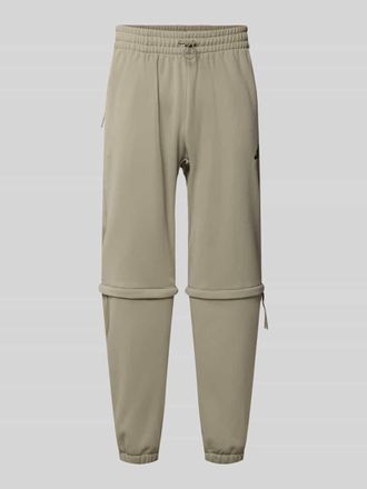 adidas Relaxed Fit Sweatpants mit Logo-Print